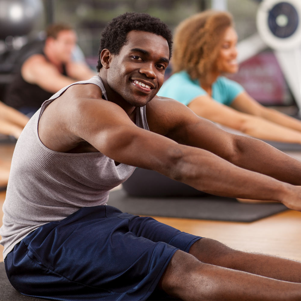 man-stretching - Cambridge YMCA